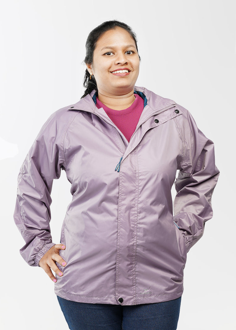Buy Stowaway waterproof jacket by Rainbird online - she wear